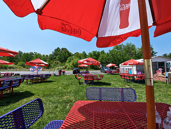 Summer perfection under Coca-Cola umbrellas – outdoor dining that captures the essence of Maine's beautiful warm-weather months.