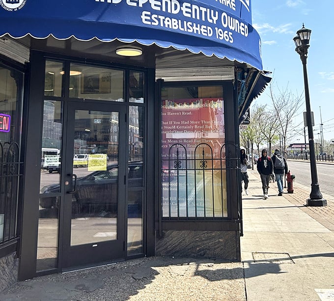 The unassuming entrance belies the literary wonderland within, where passersby might never guess at the thousands of worlds waiting behind glass doors.