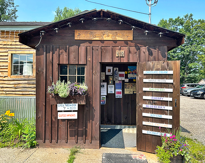 The rustic wooden fa&ccedil;ade with its window boxes and handwritten signs invites visitors into a world where pastry dreams come true.