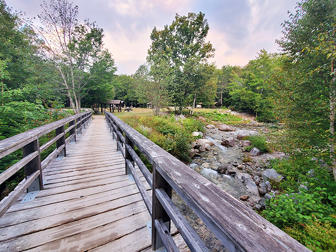This isn't just a bridge &ndash; it's the threshold between civilization and the wild heartbeat of Maine's backcountry.