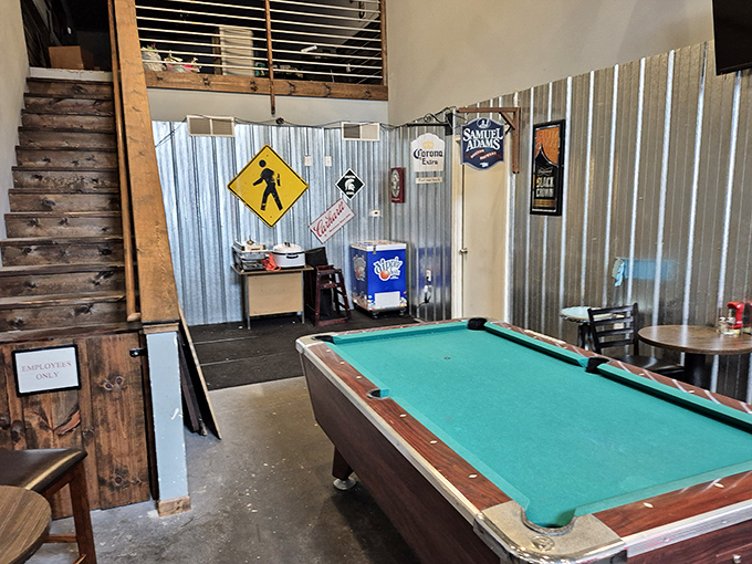 The game room offers more than just food &ndash; it's where locals gather to shoot pool and unwind. Those beer signs have witnessed countless friendly competitions.
