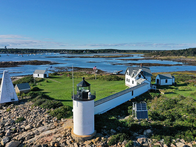 Goat Island Lighthouse stands sentinel over Kennebunkport's waters. For generations, this beacon has guided mariners home while photobombing countless tourist snapshots.
