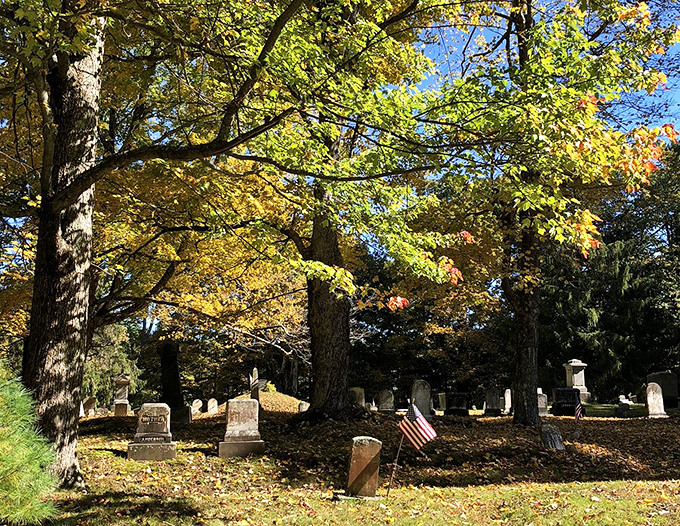 The cemetery's oldest section reveals changing burial practices – early graves face east in anticipation of resurrection on Judgment Day.