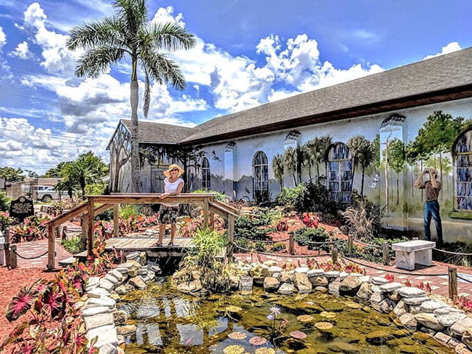 This garden mural transforms an ordinary building into a three-dimensional escape that's almost too pretty to be paint.