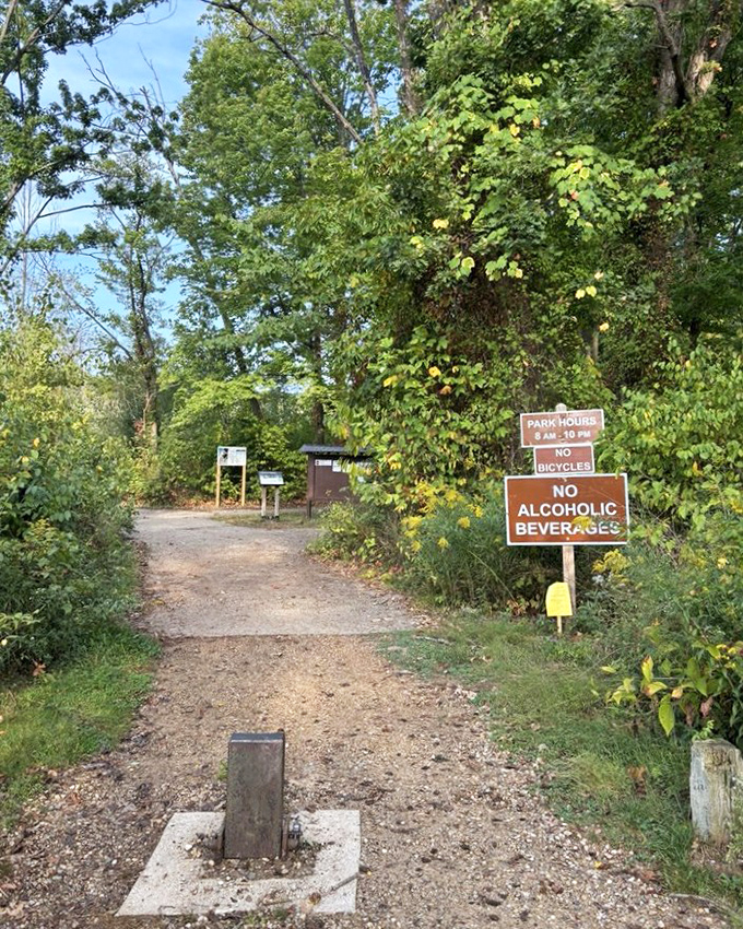 The main trailhead, where park rules are posted and the adventure begins, with no hint of the breathtaking views ahead.