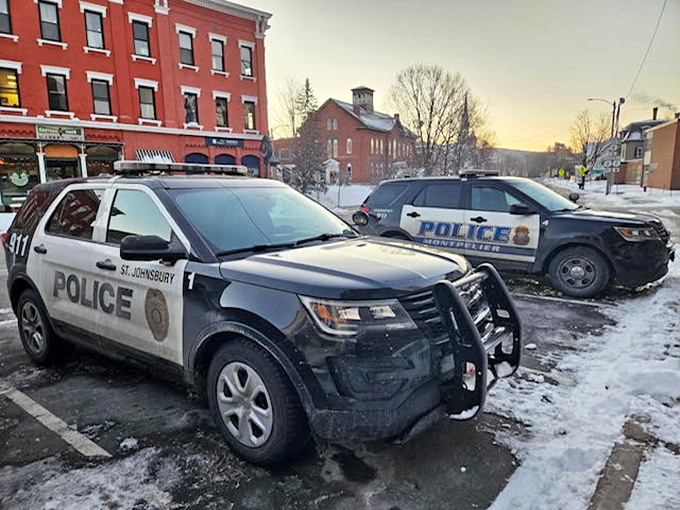 Police vehicles from Montpelier and neighboring St. Johnsbury stand ready in winter, serving communities where officers know residents by name.