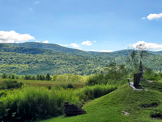 Vermont's famous green mountains roll into the distance like waves on a verdant ocean frozen in time.