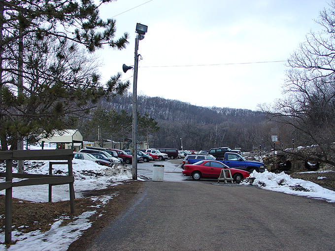 Cars cluster near the base, their owners somewhere on those snowy slopes, probably screaming with delight right about now.