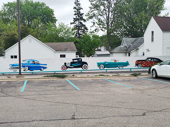 Where vintage car murals create the perfect prelude to your dining adventure, hinting at the time-travel experience waiting inside.