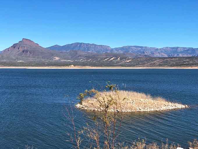 Roosevelt Lake's shoreline creates intricate patterns where water meets desert, offering peaceful scenes that invite extended contemplation.