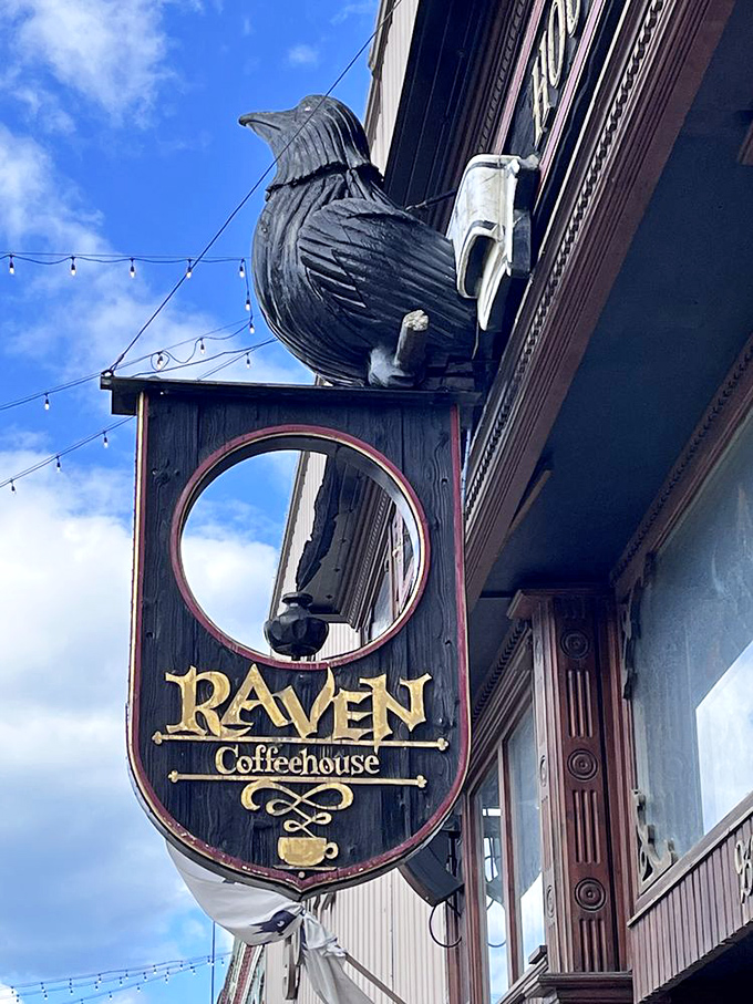 The iconic raven sculpture watches over downtown Port Huron from its perch, a guardian of literary tradition and excellent coffee below.