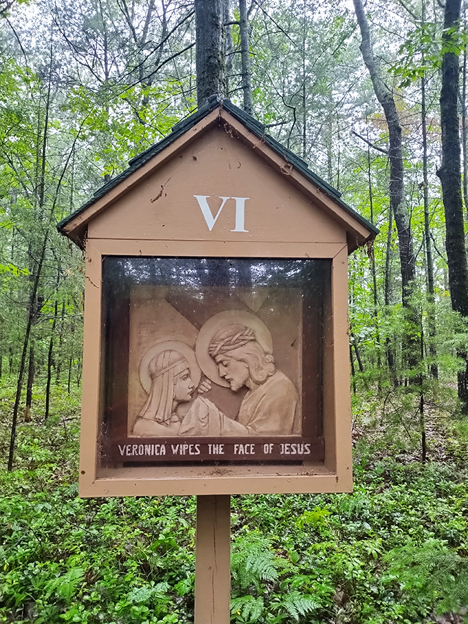 This station of the cross, housed in its own miniature woodland chapel, invites quiet contemplation along the shrine's meditative walking path.