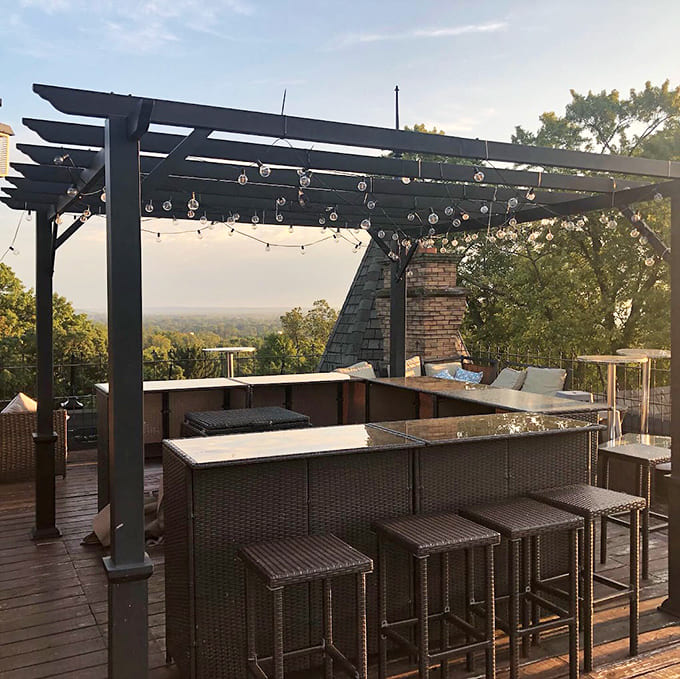 The rooftop deck and pergola create an outdoor room with million-dollar views and zero-dollar admission, which is basically winning at life.