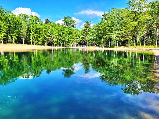 Mirror-like lake reflecting perfect blue skies &ndash; Instagram filters desperately trying to match what nature does effortlessly.