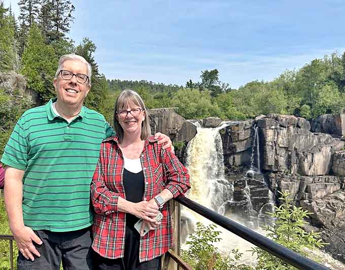 Visitors explore the greenhouse's treasures, where desert plants from around the world gather in this climate-controlled sanctuary.