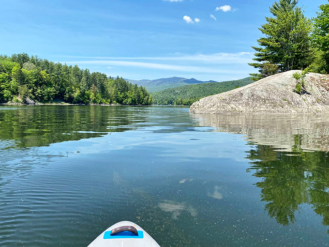 Waterbury Reservoir's crystal waters invite exploration by kayak, offering front-row seats to Vermont's mountains without the huffing and puffing of actually climbing them.