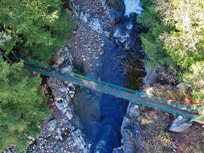 Bird's-eye brilliance: An aerial view reveals the bridge's perfect placement, spanning the gorge like a thread connecting two pieces of paradise.