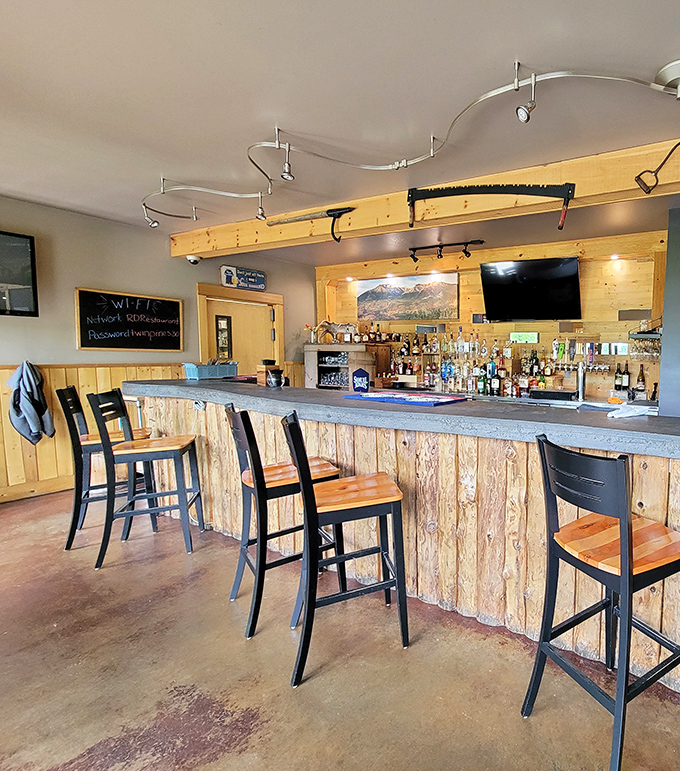 The bar combines rustic Maine woods aesthetic with sophisticated offerings &ndash; where flannel shirts and craft cocktails coexist in perfect harmony.