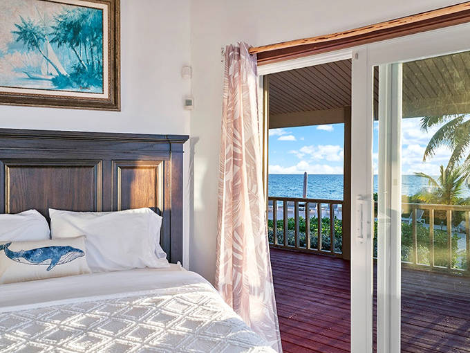 Dream weavers: Where billowing curtains frame endless blue horizons, and waking up becomes the day's first magnificent experience.