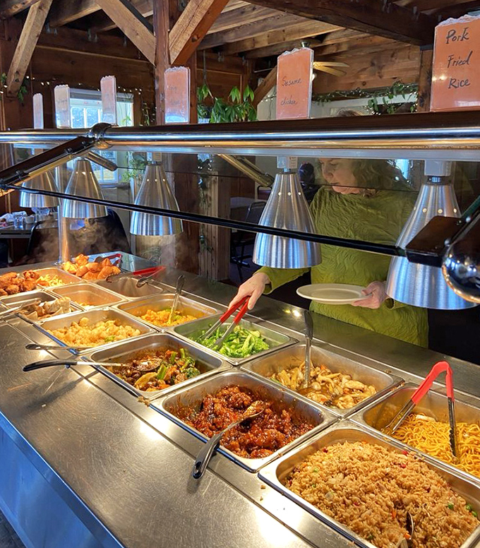The buffet line &ndash; where decisions get tough and plates get full. Those heat lamps aren't just keeping food warm; they're spotlighting the stars.