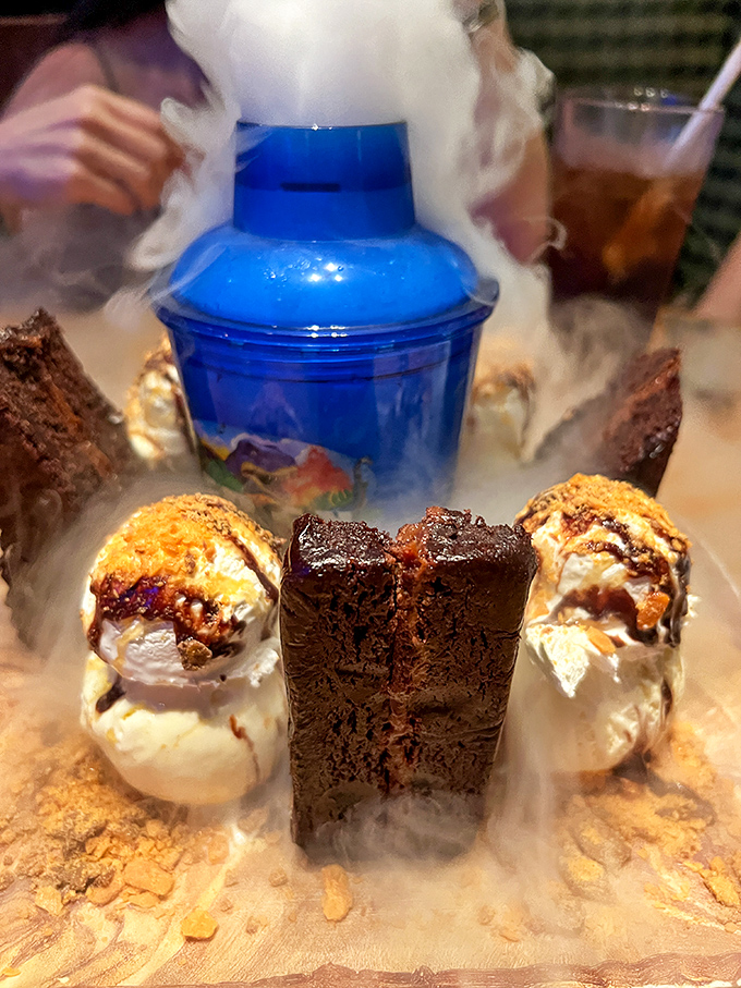 The "Chocolate Extinction" dessert arrives billowing with dry ice "smoke" &ndash; a showstopper meant for sharing unless you're planning to hibernate afterward.
