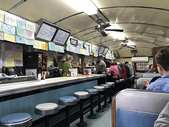 The counter view reveals the diner's efficient use of space, with every inch serving a purpose in this well-choreographed culinary ballet.