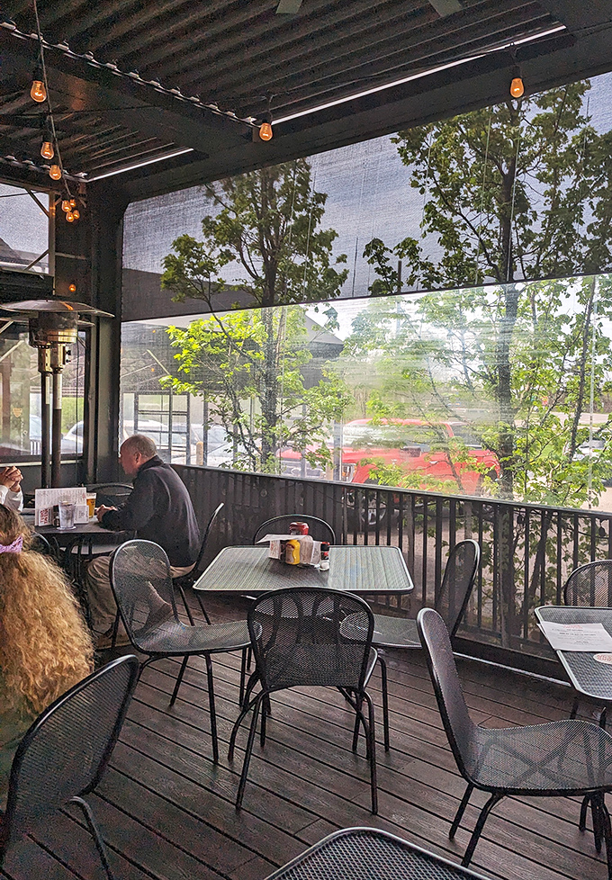 The covered patio offers a breath of fresh air and dappled sunlight – the perfect setting for lingering over lunch or dinner during Michigan's warmer months.