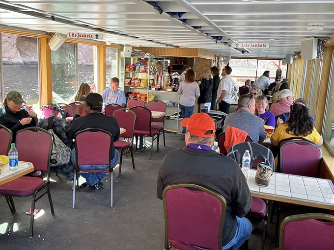 The upper deck offers unobstructed views perfect for wildlife spotting during day cruises and stargazing during evening astronomy tours.