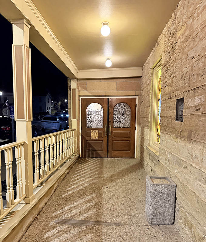 The entrance &ndash; a portal between centuries that promises delicious adventures in historical dining just beyond those wooden doors.