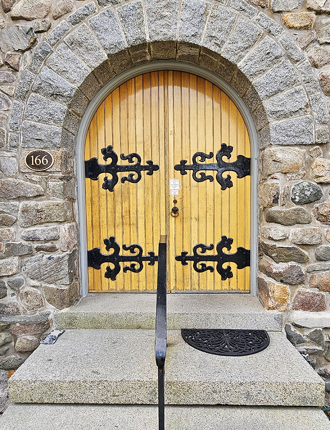 Those magnificent yellow doors with ornate black hinges aren't just an entrance &ndash; they're a portal to countless worlds contained within pages.