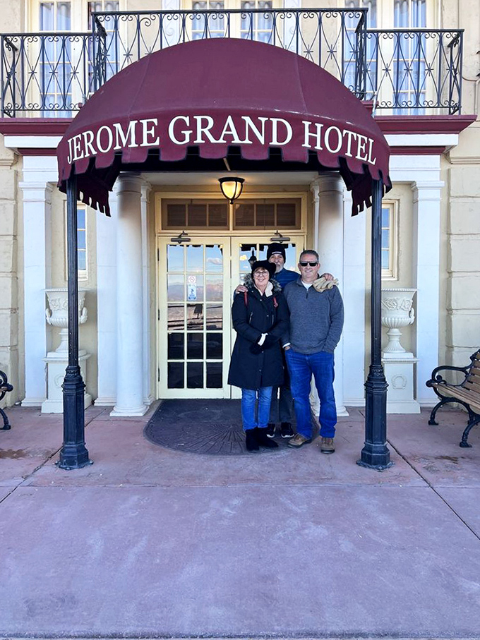 The grand entrance welcomes visitors with historic elegance, though some guests swear they've been greeted by more than just the visible hotel staff.