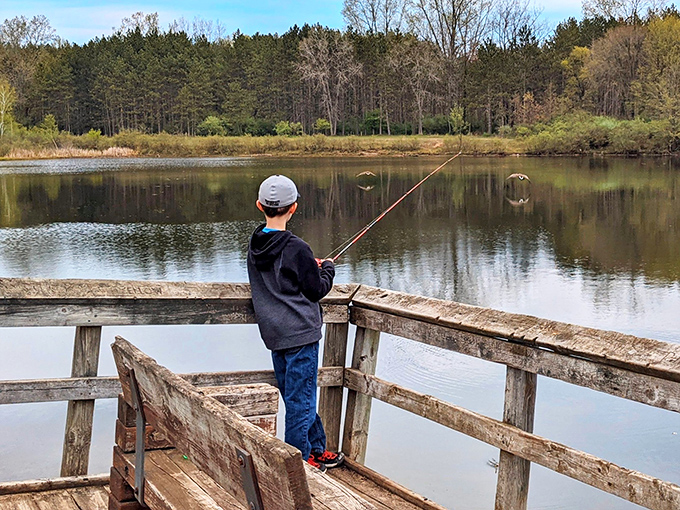 Young anglers learn patience at the fishing dock, where catching something is just a bonus to the real prize, uninterrupted time with nature.
