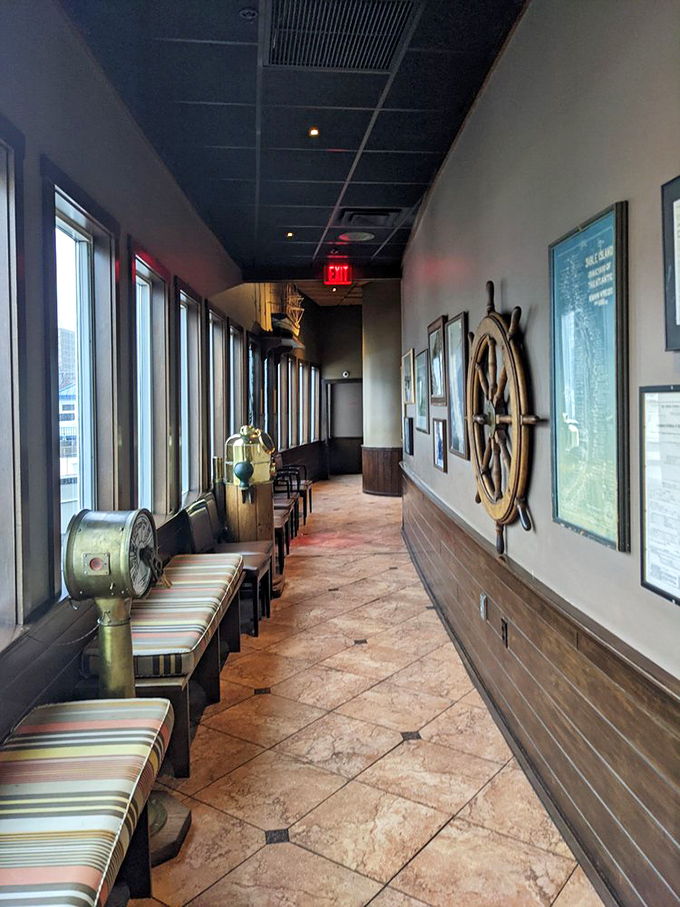 Nautical-themed corridors connect dining areas &ndash; ship wheels and maritime artifacts create authentic floating restaurant ambiance.
