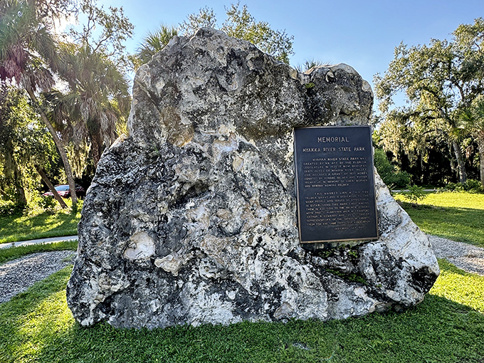 This memorial plaque stands as a silent storyteller, connecting today's visitors with the park's rich history and those who helped preserve it.