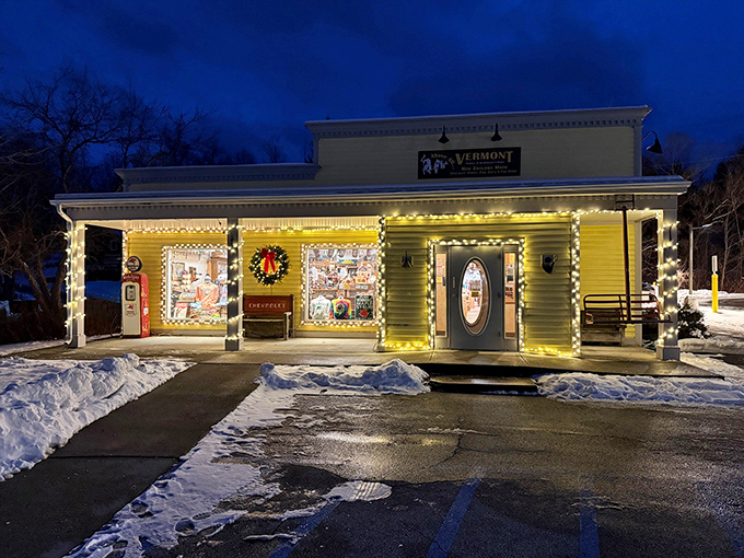 By night, Above All Vermont transforms into a glowing beacon of warmth against the mountain darkness.