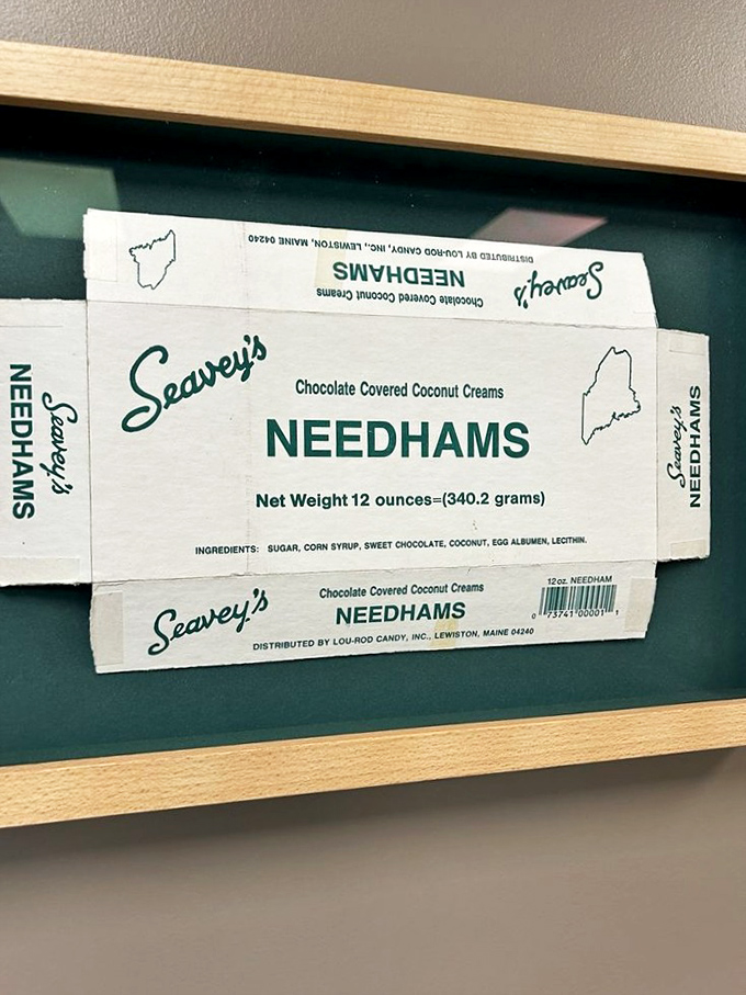 Vintage packaging tells the story of Needhams through time – a sweet history lesson preserved under glass for curious visitors.