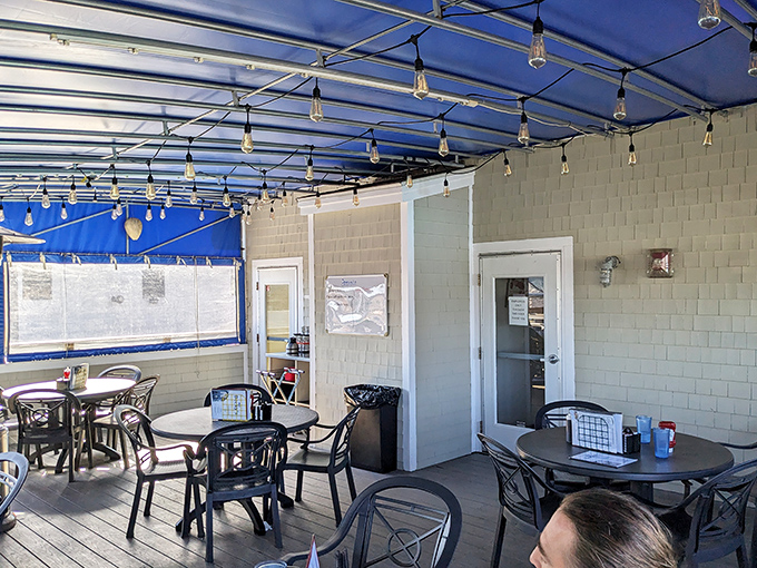 The outdoor dining area offers fresh sea breezes with your meal &ndash; nature's perfect seasoning for coastal Maine cuisine.