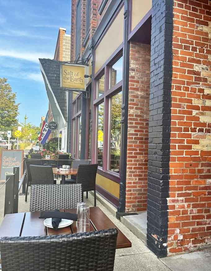 The outdoor seating area offers a front-row view of Fennville's small-town charm &ndash; perfect for people-watching while savoring seasonal delights on sunny Michigan days.