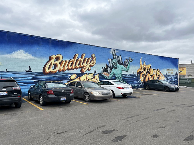 That parking lot mural featuring Lady Liberty herself holding pizza instead of a torch tells you everything about American priorities.