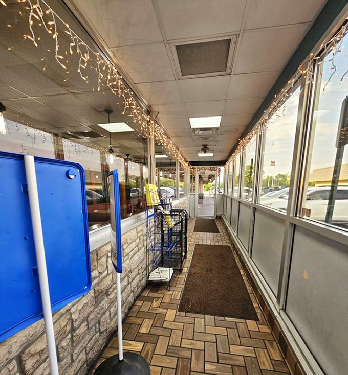 The entrance pathway to Tony's, where fairy lights guide hungry pilgrims toward their bacon-laden destiny year-round.