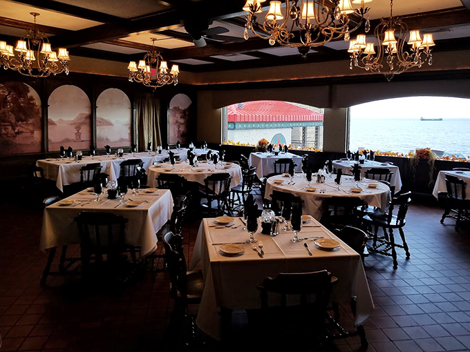 Each table offers a front-row seat to culinary theater, where Lake Superior's dramatic backdrop enhances every bite.