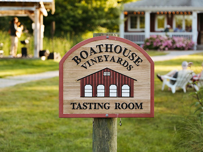 Your invitation to paradise: The simple wooden sign marks the entrance to a world where time slows and wine flows.