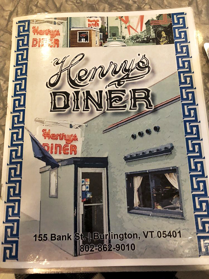 The menu cover features hand-drawn images of the diner itself, because even the paperwork here has more character than most modern restaurants' entire aesthetic.