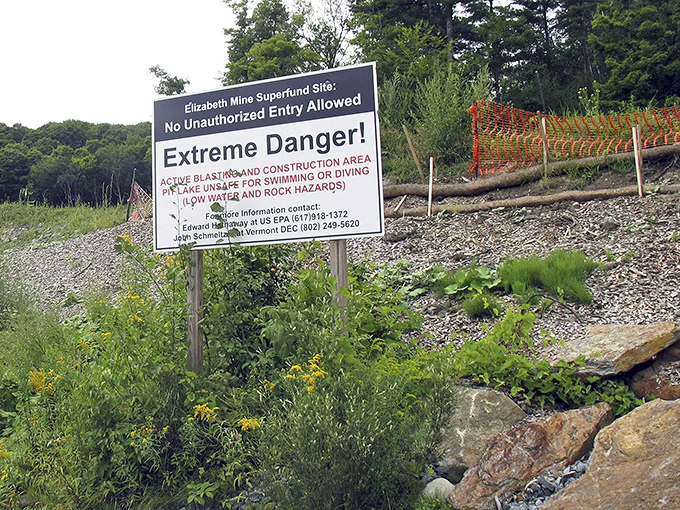Those "Extreme Danger" signs aren't suggestions, they're serious warnings about a site that's still being remediated, because even beautiful places can have hazards lurking beneath their photogenic surfaces.