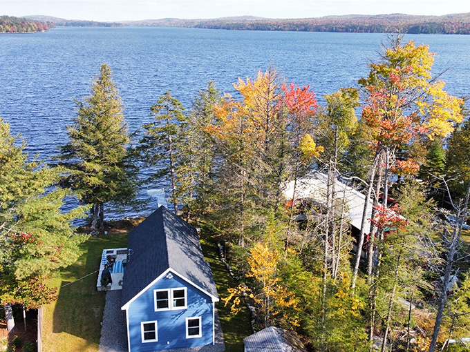 The aerial view of Sebec reveals its strategic position along Maine's coast, with bridges spanning the wide Kennebec River.