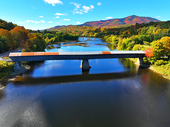 Aerial view showcases the bridge's perfect placement in the landscape, connecting not just two states but past and present.