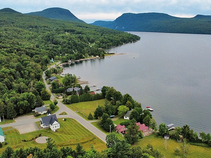 The winding road hugs Willoughby's shore, revealing new postcard-worthy vistas around every curve.