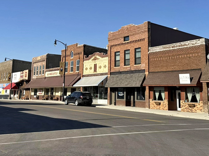Historic downtown storefronts showing their age beautifully, proving restoration doesn't always need to strip away character for polish.