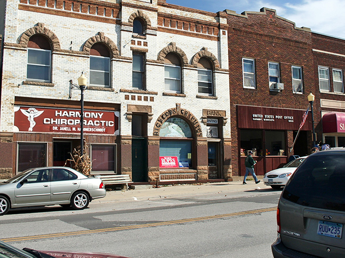 Downtown Harmony's historic buildings tell stories in brick and stone, where modern businesses thrive in spaces that have witnessed generations of community life.