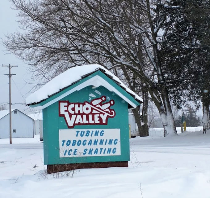The Echo Valley sign welcomes visitors to a world of winter sports excitement, promising adventures that'll leave you breathless and grinning.